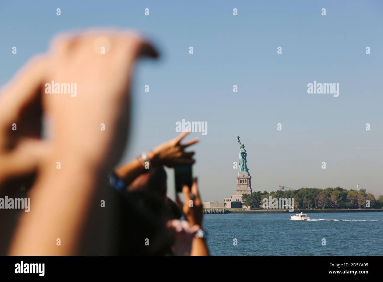 Photographing the statue of liberty hi-res stock photography and images ...