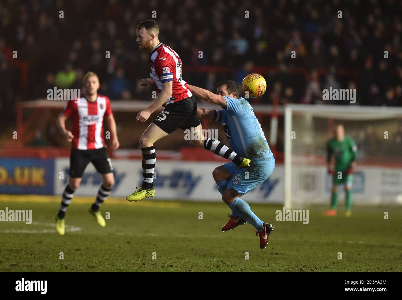 Exeter City's Jake Taylor (right) and Coventry City's Micahel Doyle ...