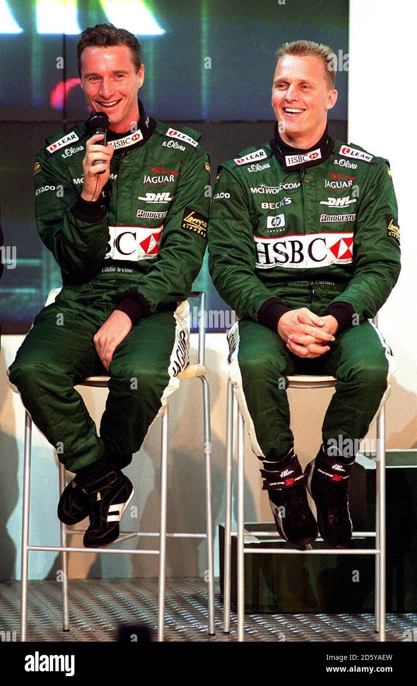 Eddie Irvine (l) chats with new Jaguar teammate Johnny Herbert (r Stock ...