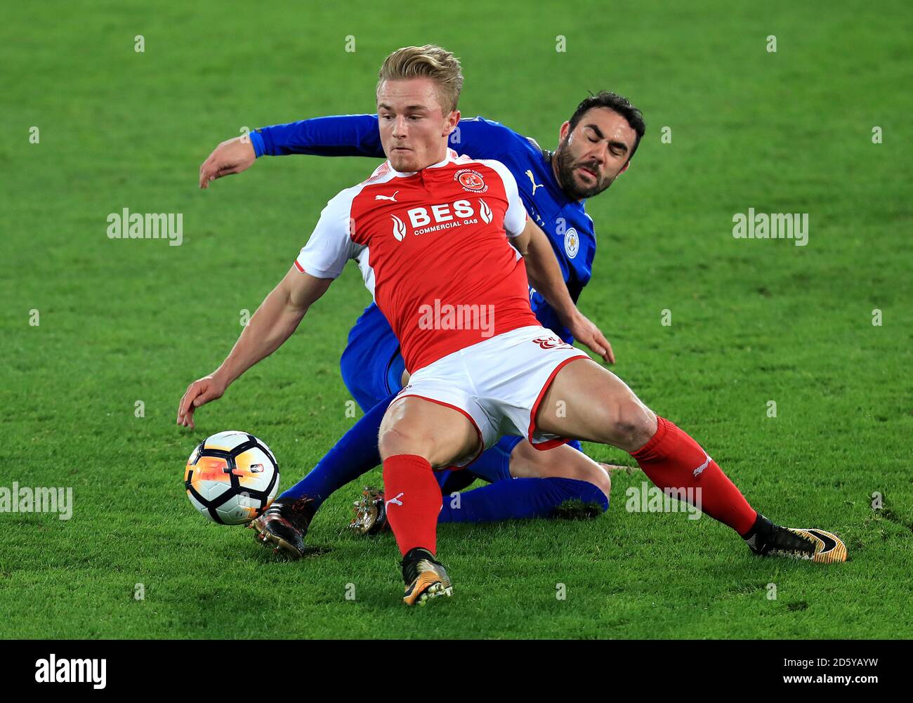 Fleetwood Town's Kyle Dempsey (left) and Leicester City's Vicente ...