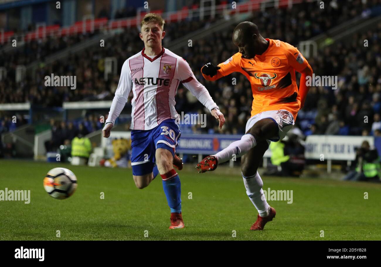 Reading's Sone Aluko and Stevenage's Mark McKee battle for the ball ...