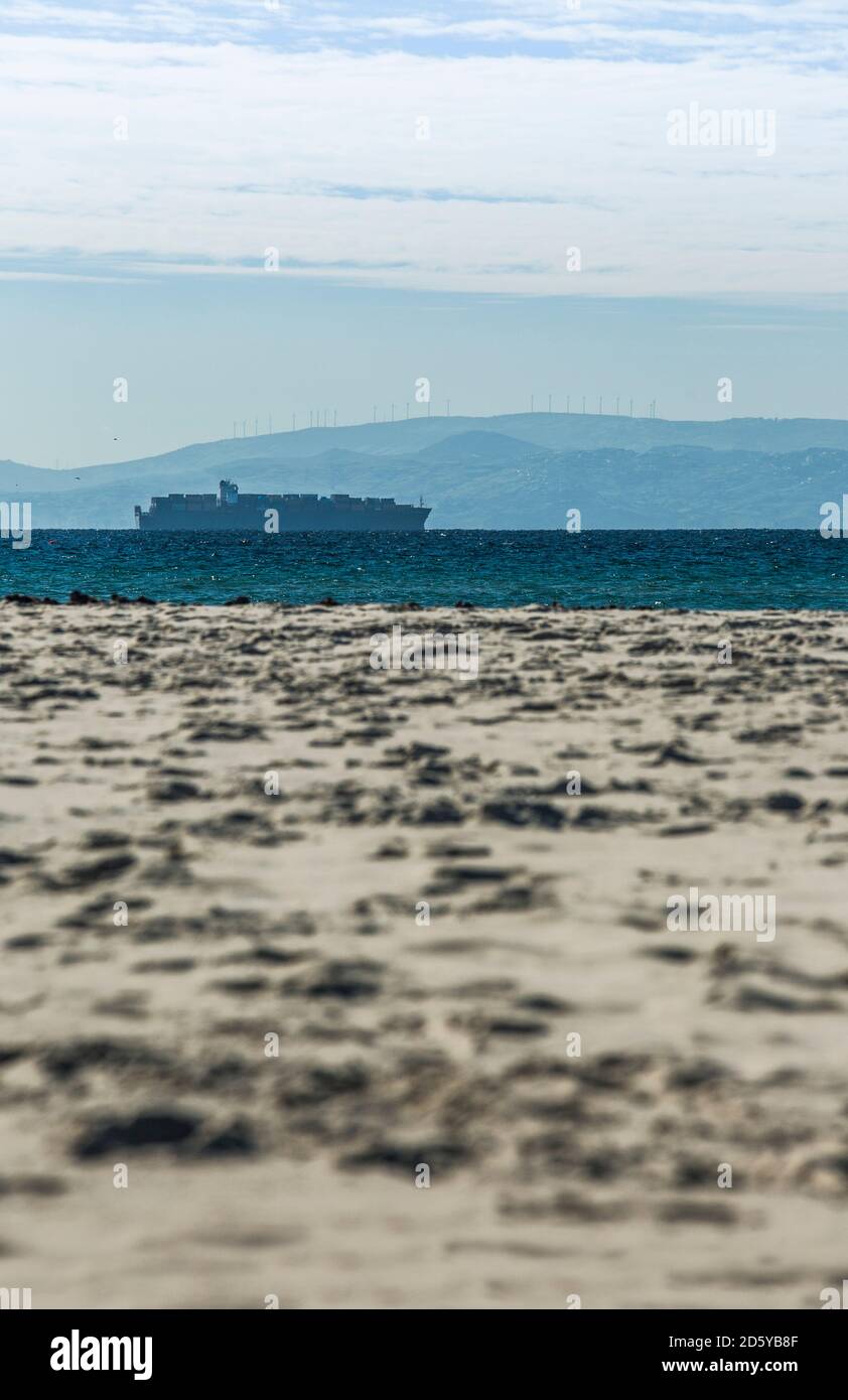 Spain, Andalusia, Tarifa, cargo ship on the ocean Stock Photo - Alamy