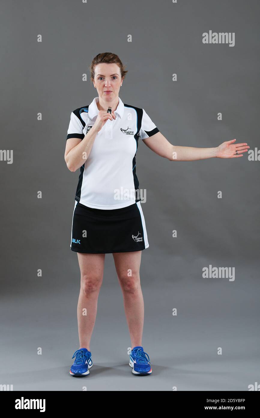 Umpire Louise Travis signalling direction of pass Stock Photo - Alamy