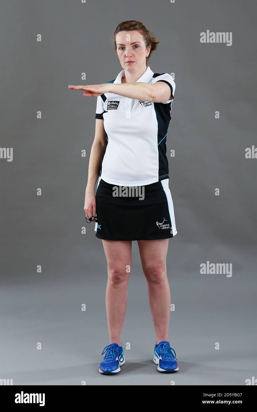 Umpire Louise Travis signalling ordering off Stock Photo - Alamy