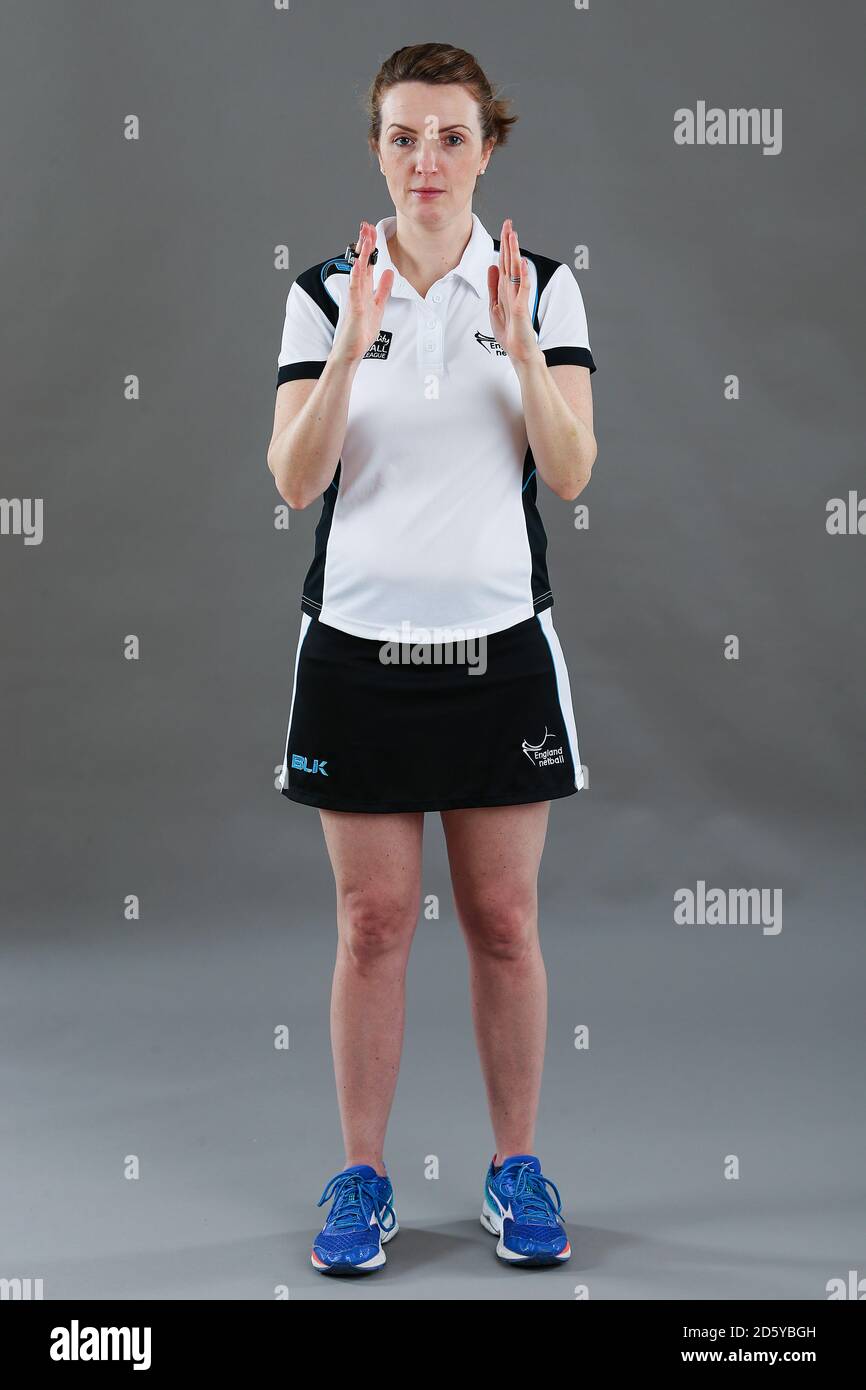 Umpire Louise Travis signalling short pass Stock Photo - Alamy