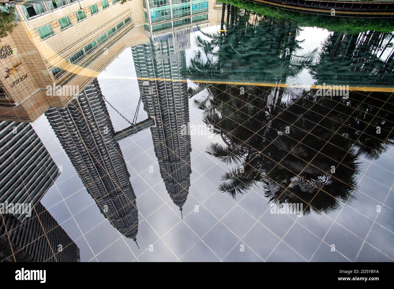 Reflection of petronas towers in a pond hi-res stock photography and ...