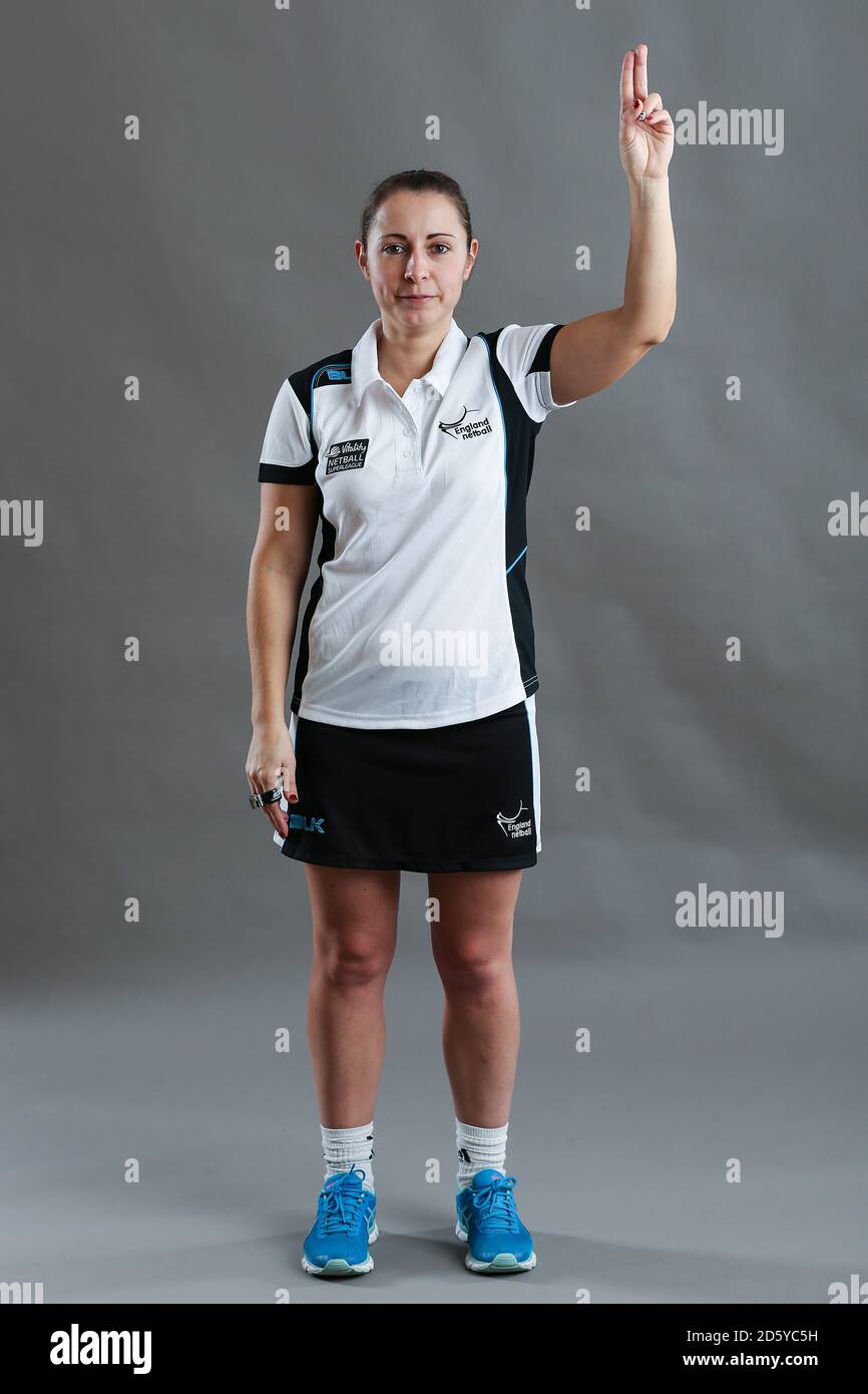 Umpire Kate Mann signalling suspension Stock Photo - Alamy