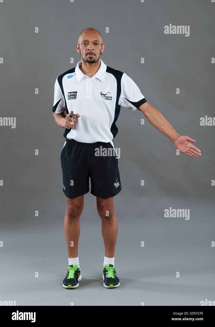 Umpire Ian Fuller signalling throw in - goal line Stock Photo - Alamy