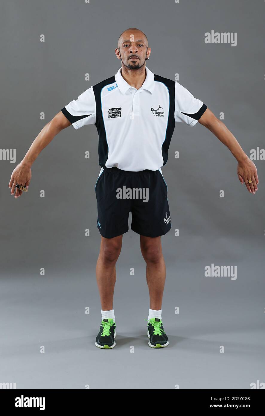 Umpire Ian Fuller signalling obstruction of player without ball Stock ...