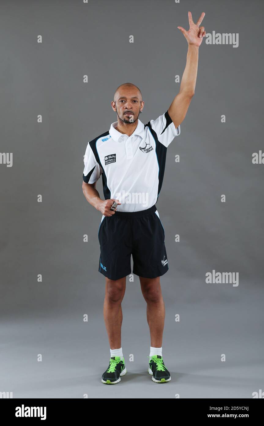Umpire Ian Fuller signalling held ball Stock Photo - Alamy
