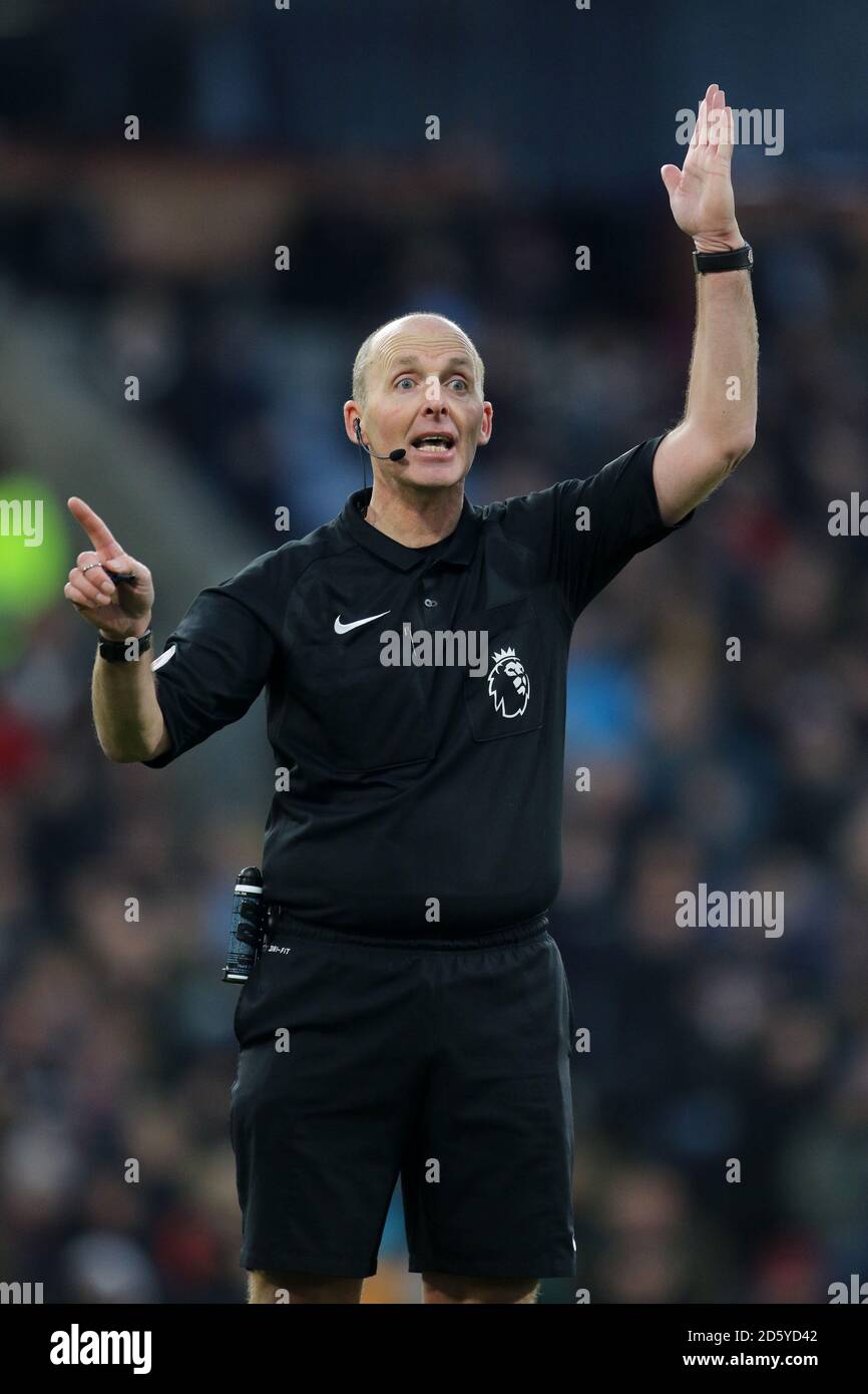 Referee Mike Dean gestures Stock Photo - Alamy