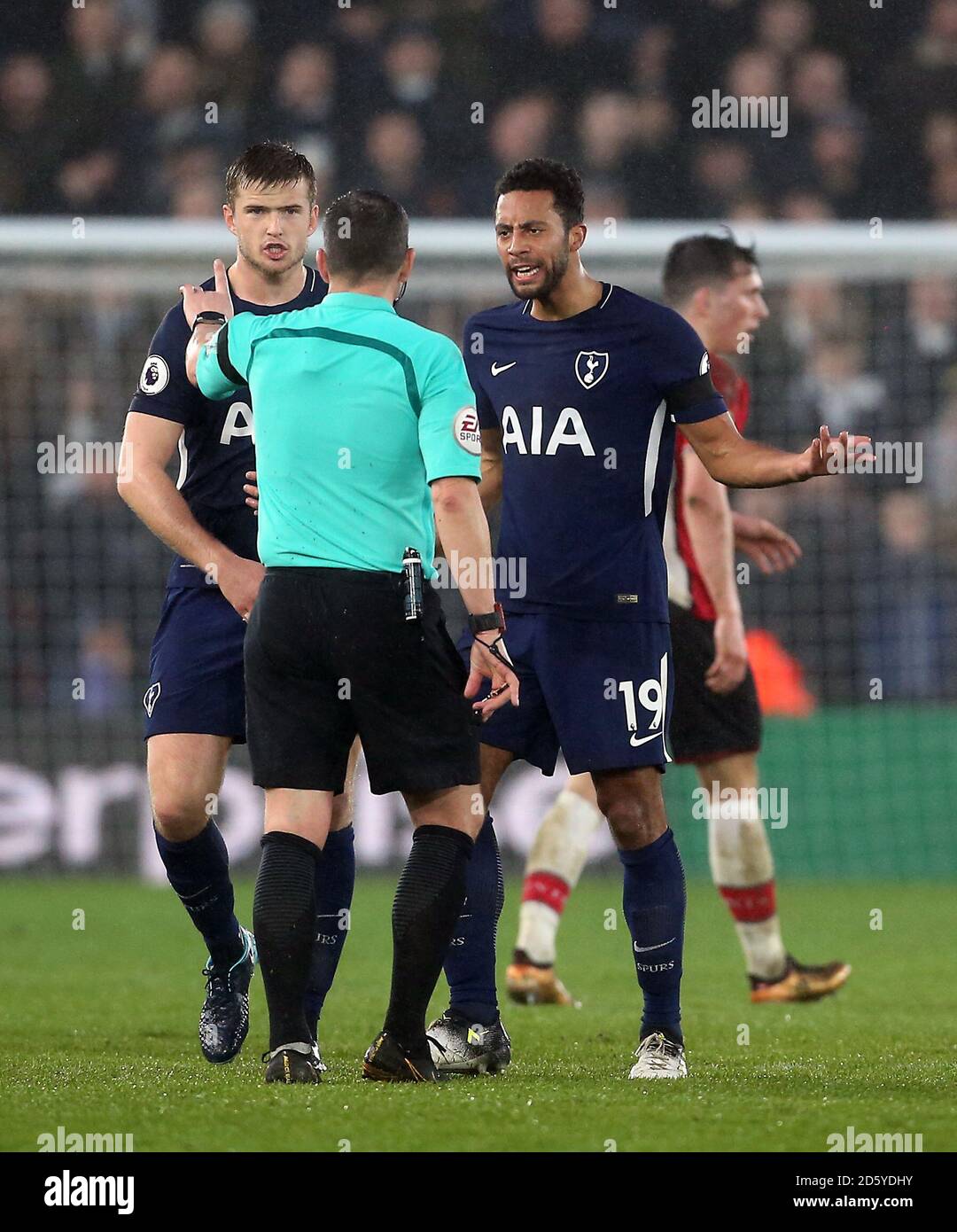 Tottenham Hotspur's Mousa Dembele (right) and Eric Dier (left) speak to ...