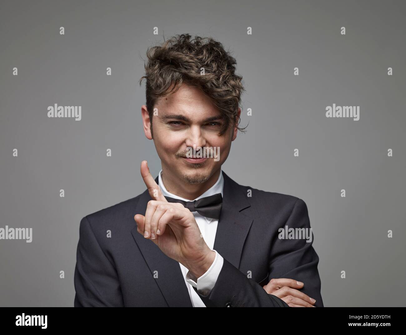 Portrait of man with outstretched index finger Stock Photo - Alamy