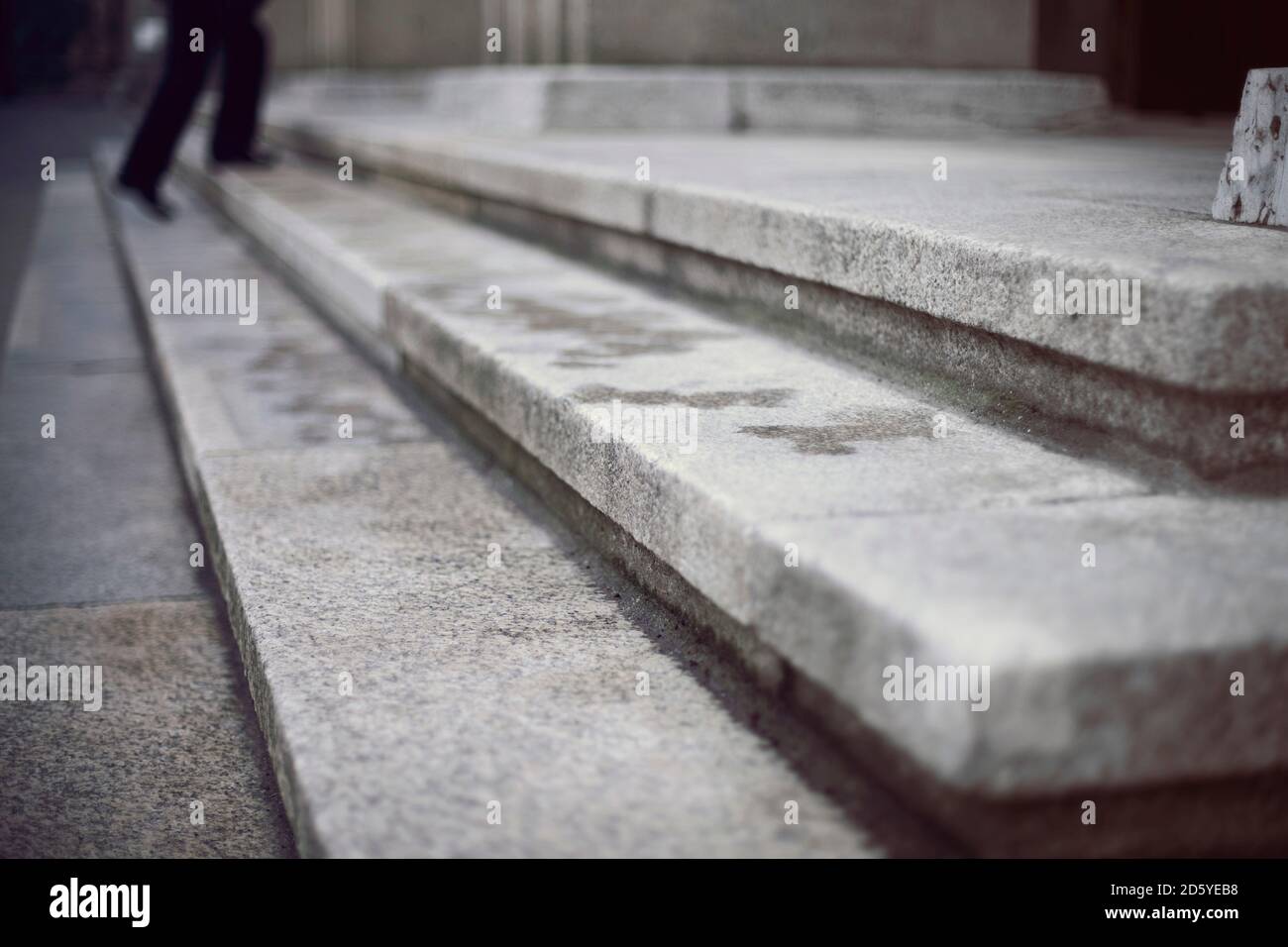 Person walking up stairs hi-res stock photography and images - Alamy