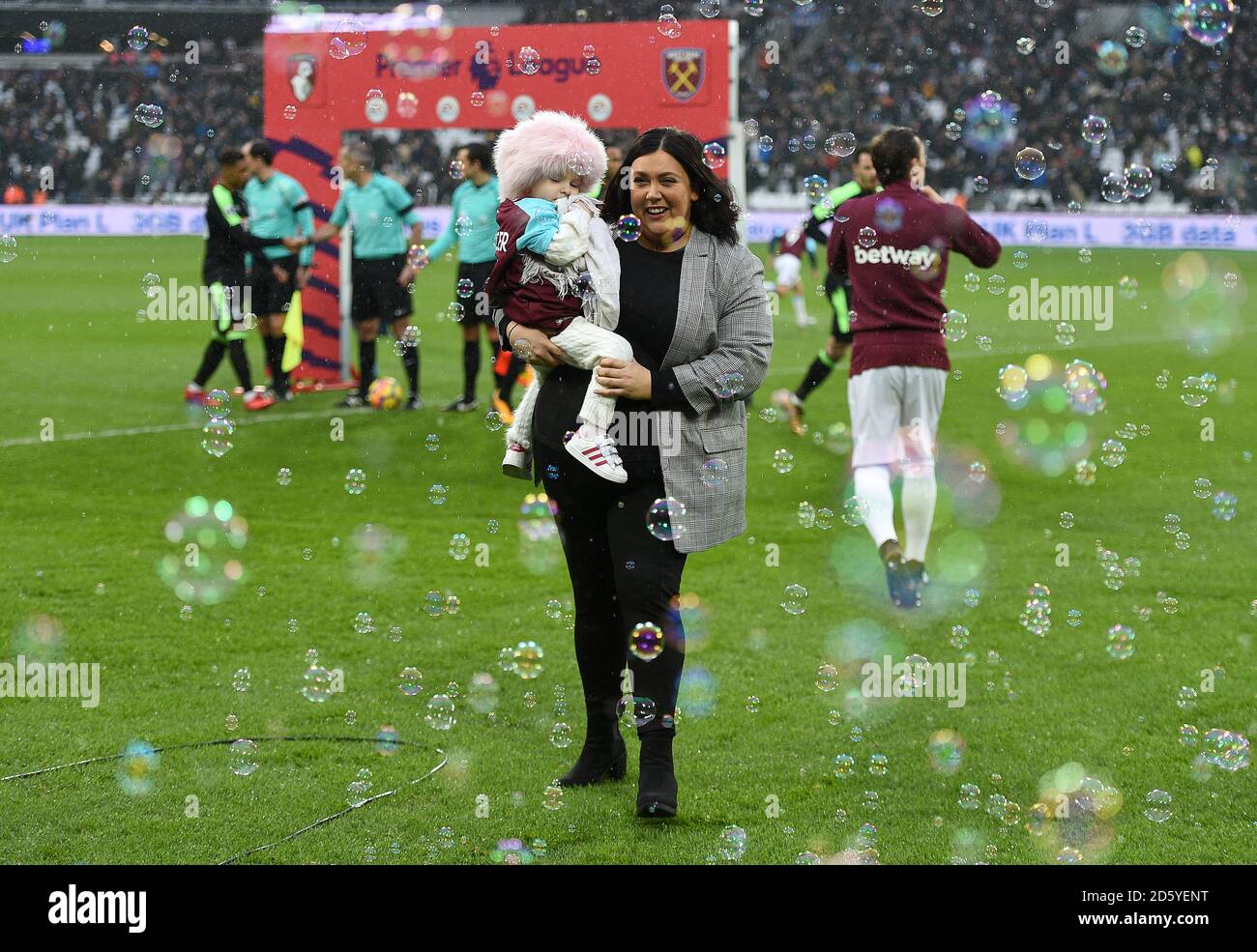 Cancer sufferer Isla Caton with her mother Nicola Caton before the game ...