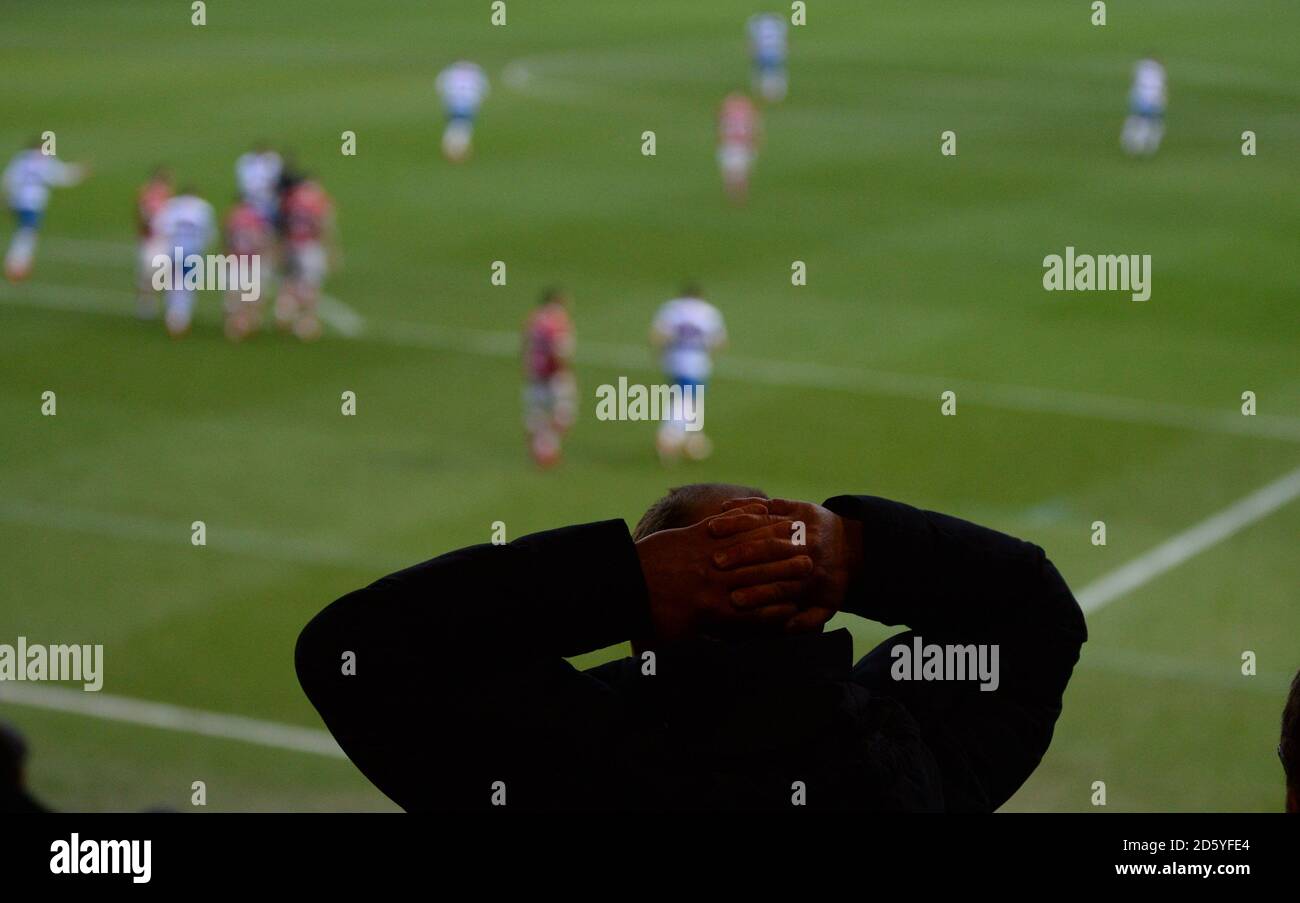 A Queens Park Rangers fan looks on dejected Stock Photo - Alamy