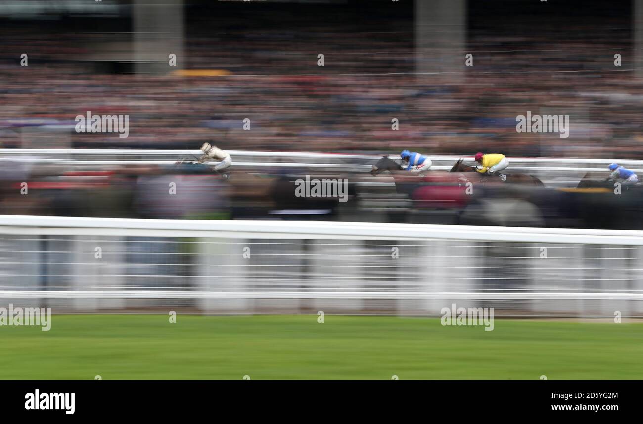 Runners and riders in action during the Crest Nicholson Handicap Chase ...