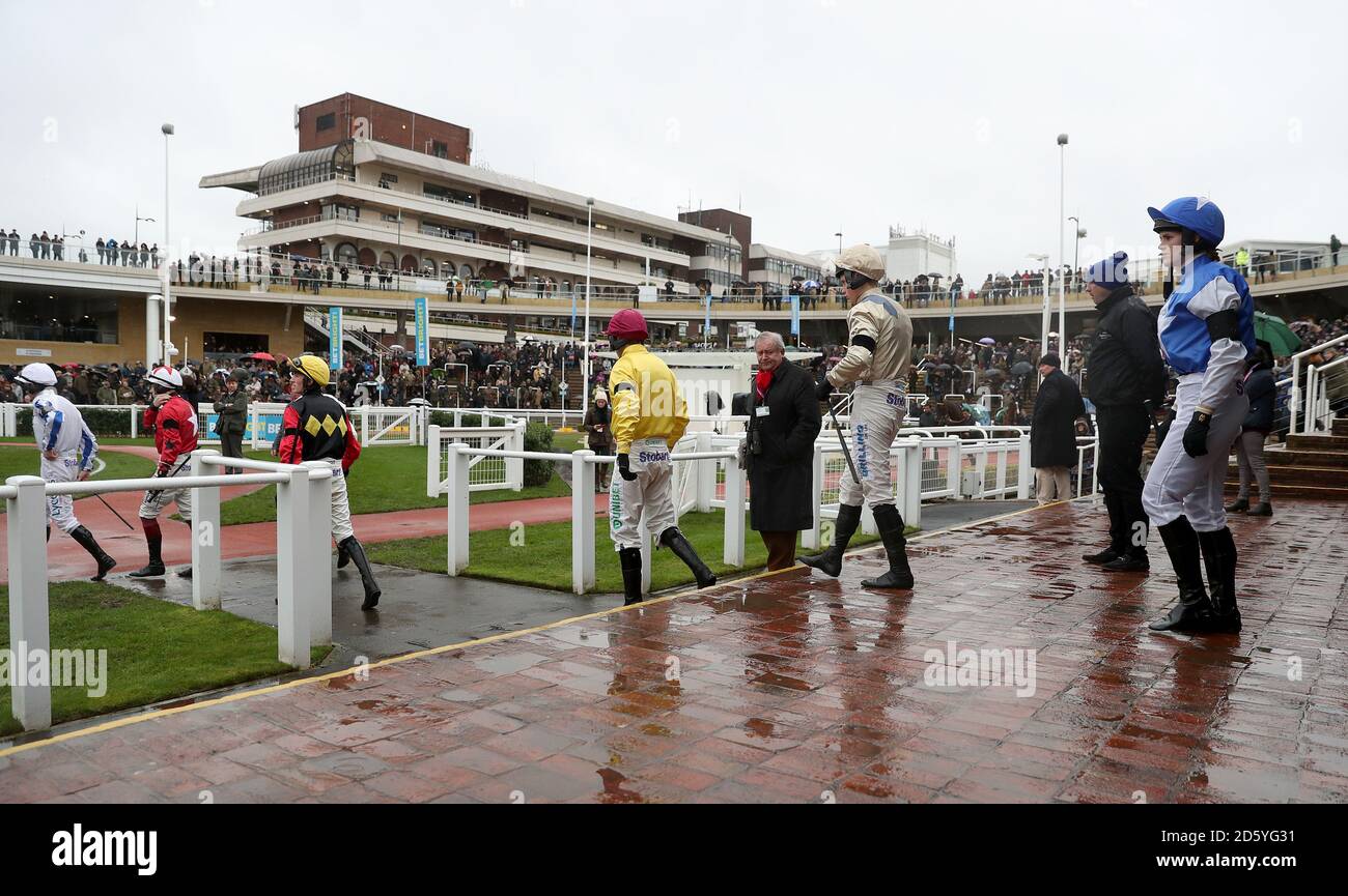 Jockeys make their way from the weighing room before the Crest ...