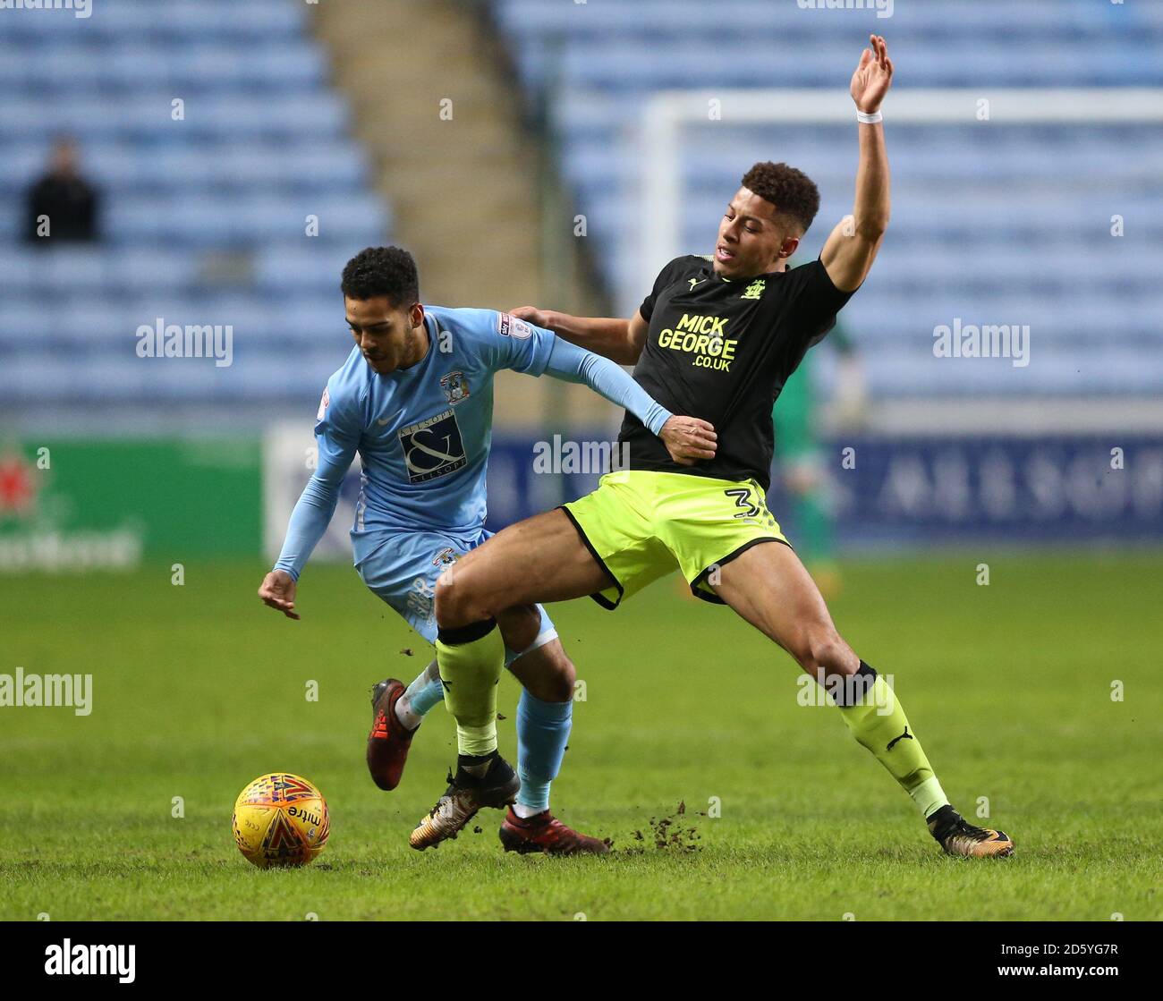 Coventry City's Devon Kelly-Evans (left) and Cambridge United's Jake ...
