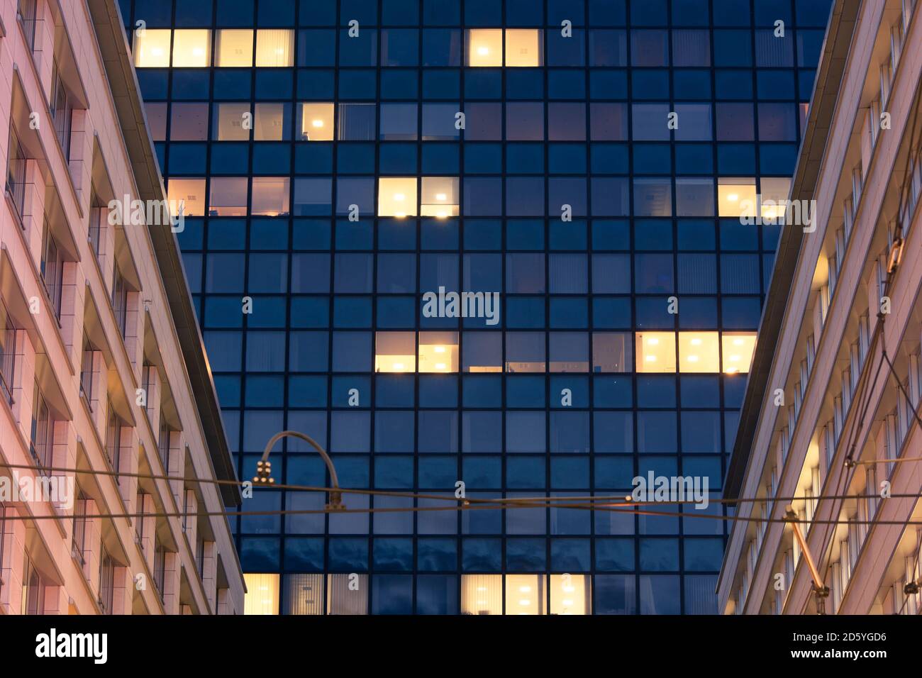 Germany, Berlin-Mitte, illuminated windows of modern office building ...