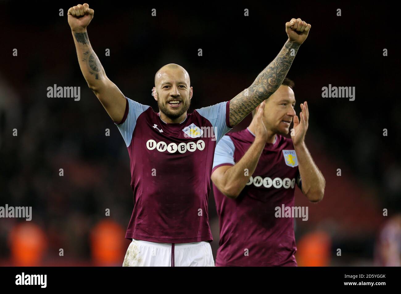 Aston Villa's Alan Hutton (left) celebrates the win Stock Photo - Alamy