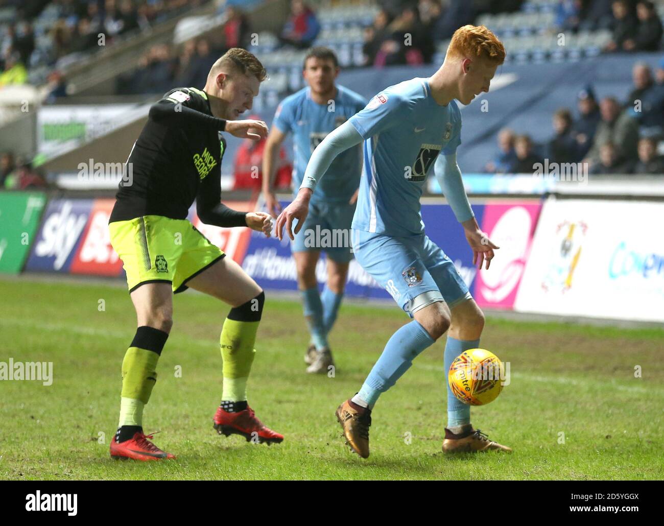 Coventry City's Ryan Haynes (right) and Cambridge United's George Maris ...