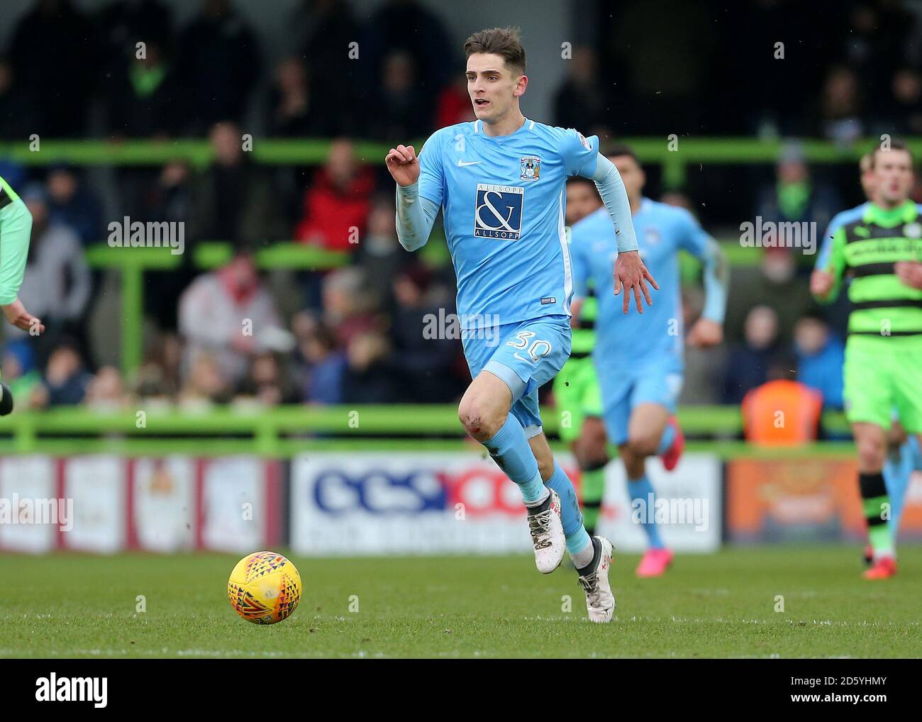 Coventry City's Tom Bayliss brings the ball forward Stock Photo - Alamy