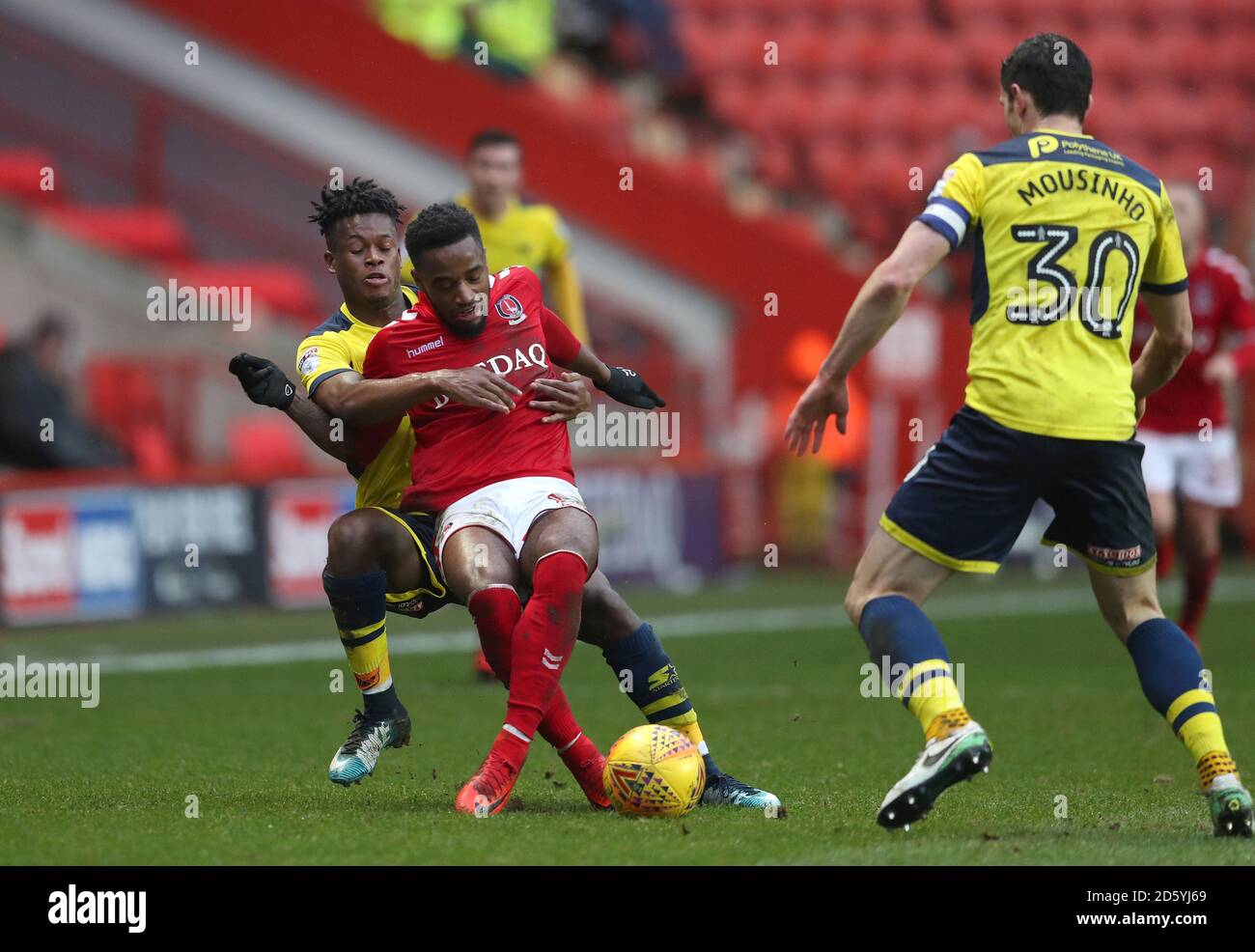 Charlton Athletic's Tarique Fosu (centre) and Oxford United's Isaac ...