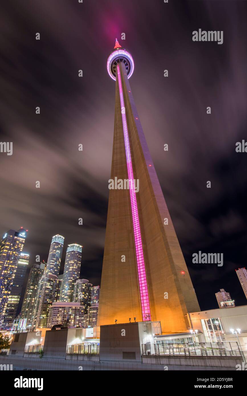 Canada, Ontario, Toronto, CN Tower, pink light, moving clouds, long ...