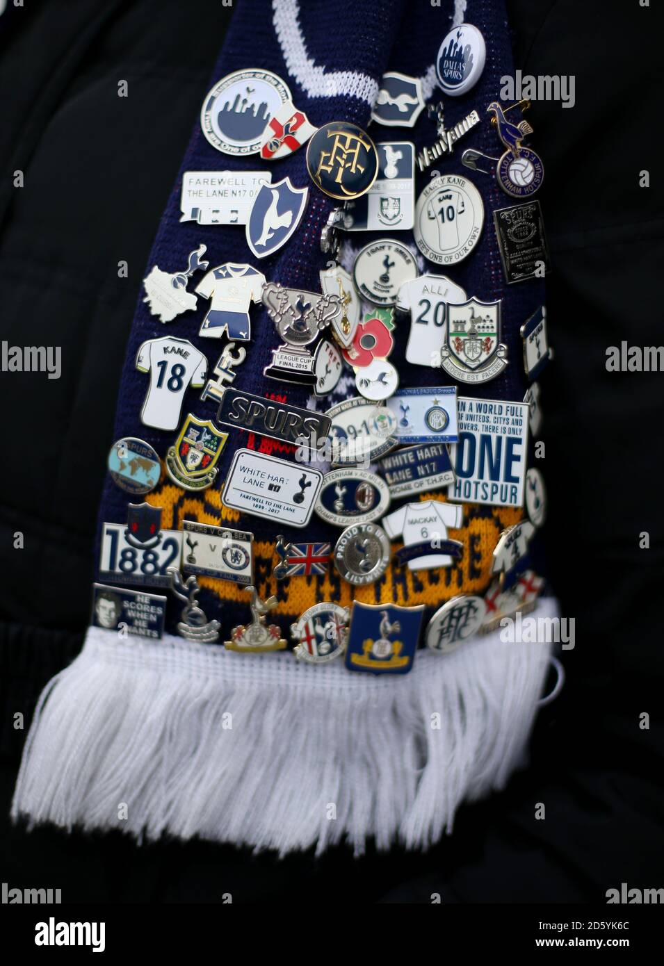 Tottenham Hotspur fans scarf covered in badges Stock Photo - Alamy