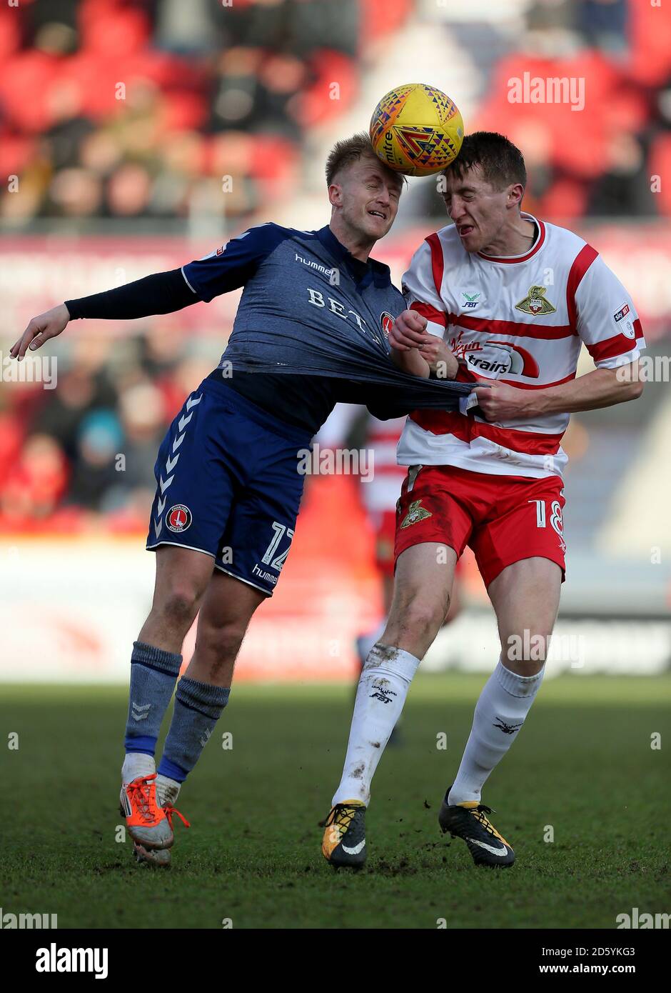 Doncaster's Tom Anderson and Charlton Athletic's Ben Reeves battle ...