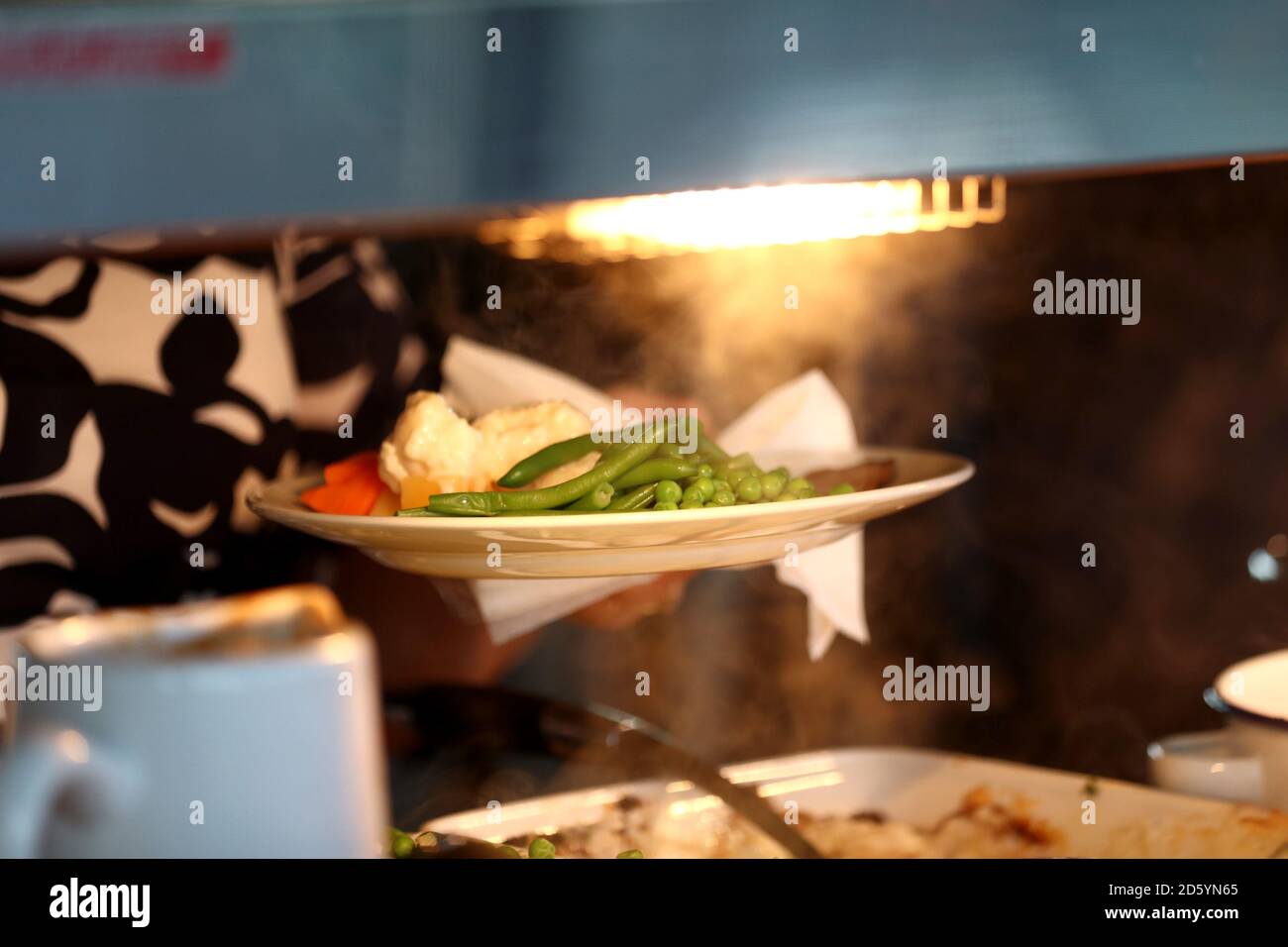 Food is served during Super Sunday at Exeter Racecourse Stock Photo - Alamy