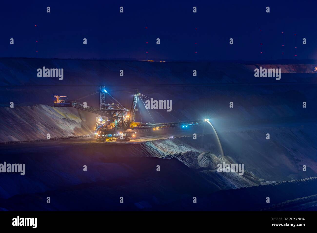 Germany, Juechen, lighted spreader at brown coal mining Garzweiler ...