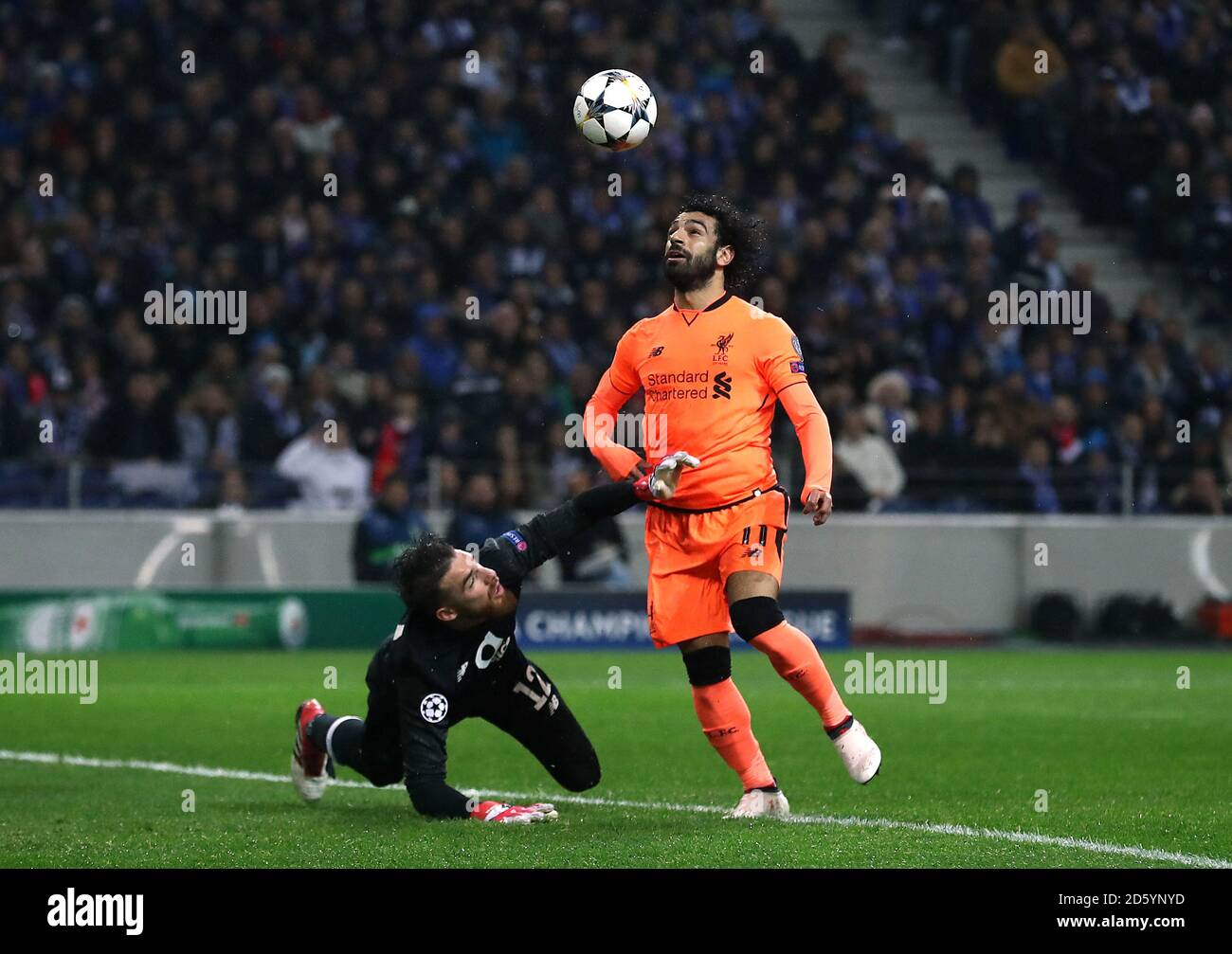 Liverpool's Mohamed Salah (right) scores his side's second goal of the ...