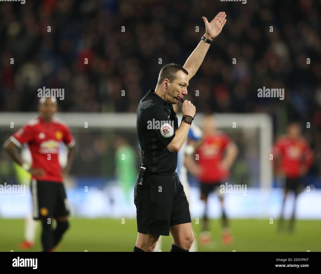 Referee Kevin Friend signals that Manchester United's second goal of ...