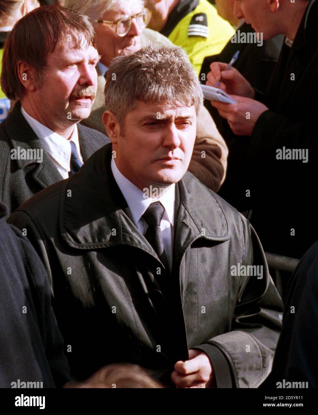 TV comedian Nick Hancock leaves the church after attending the funeral ...