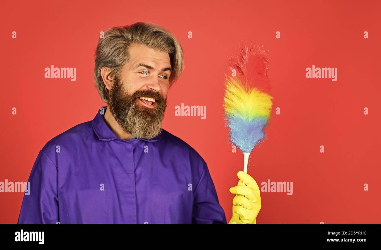 Cleaning apartment. Man use pp duster. Dust allergy. Polypropylene ...