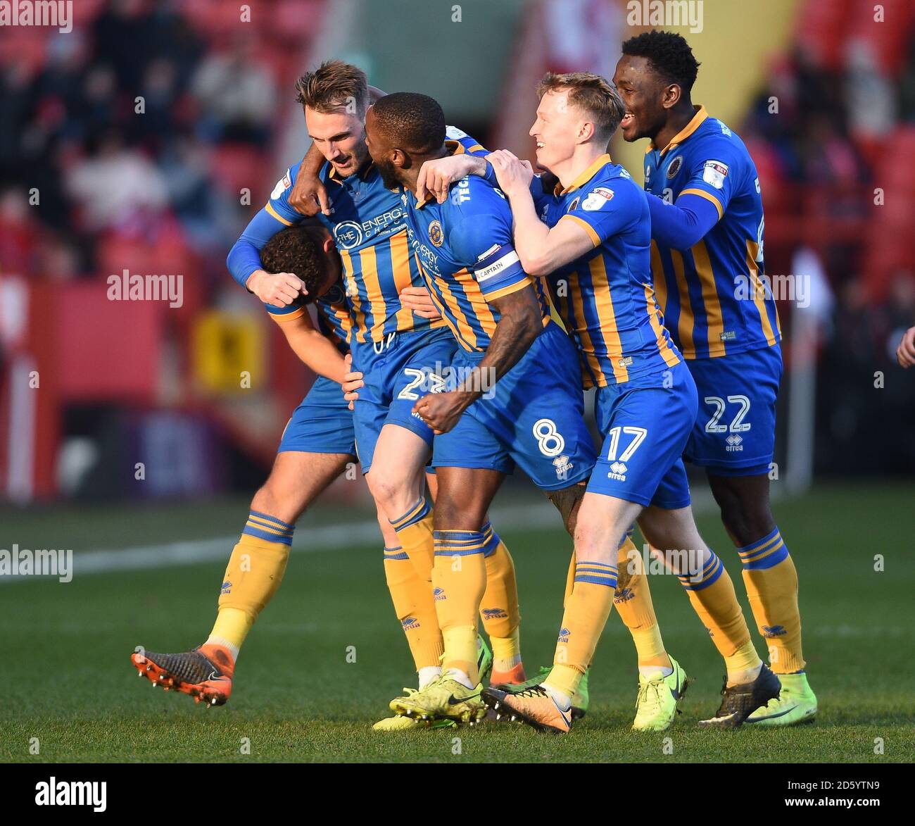 Shrewsbury Town's Alex Rodman is mobbed by team mates after scoring his ...