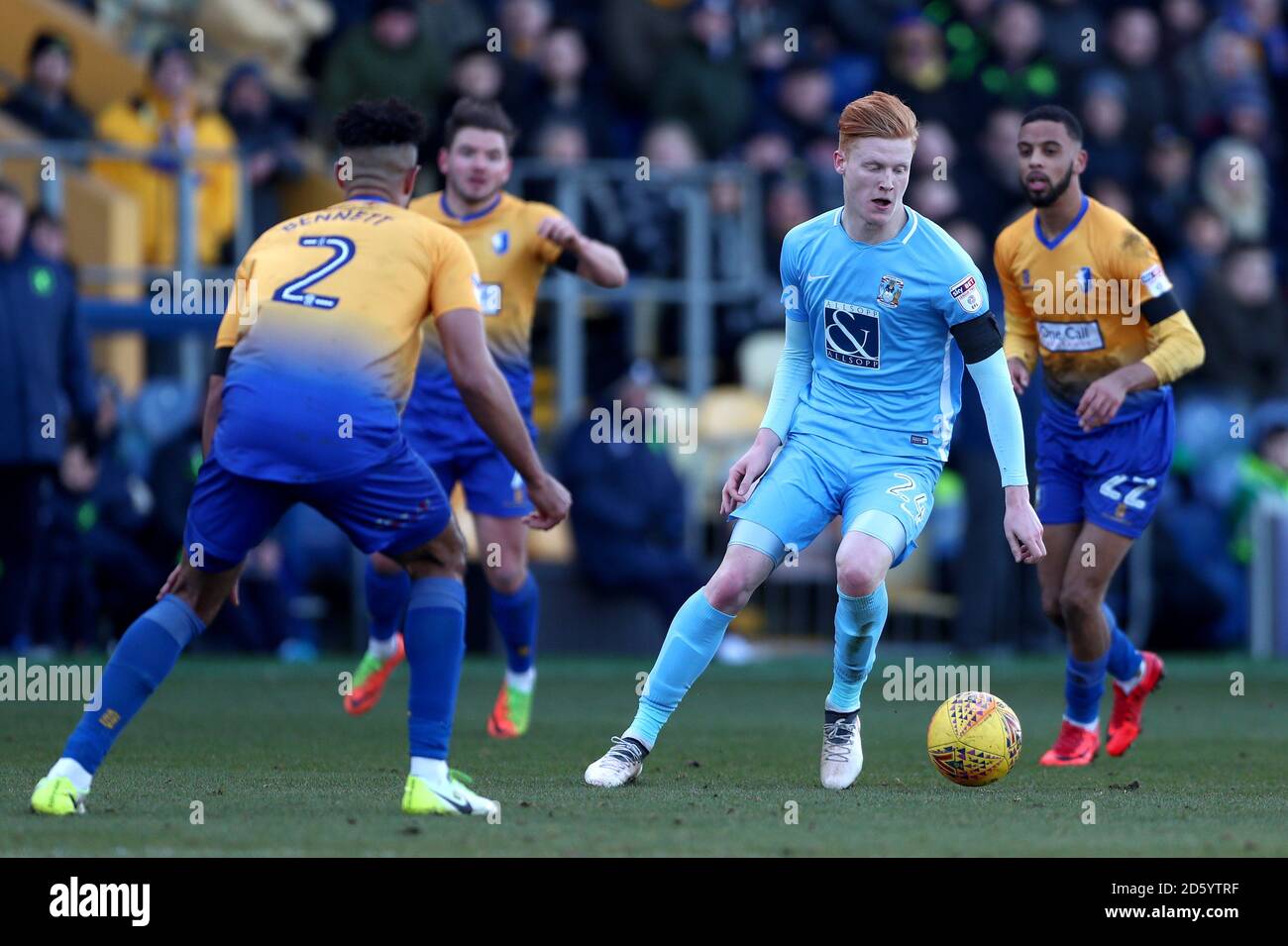 Coventry City's Ryan Haynes (right) and Mansfield Town's Rhys Bennett ...