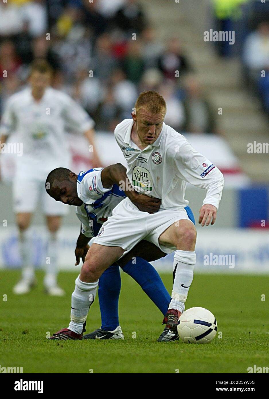 l-r Halifax Town's Tyrone Thompson and Hereford United's Andy Ferrell ...