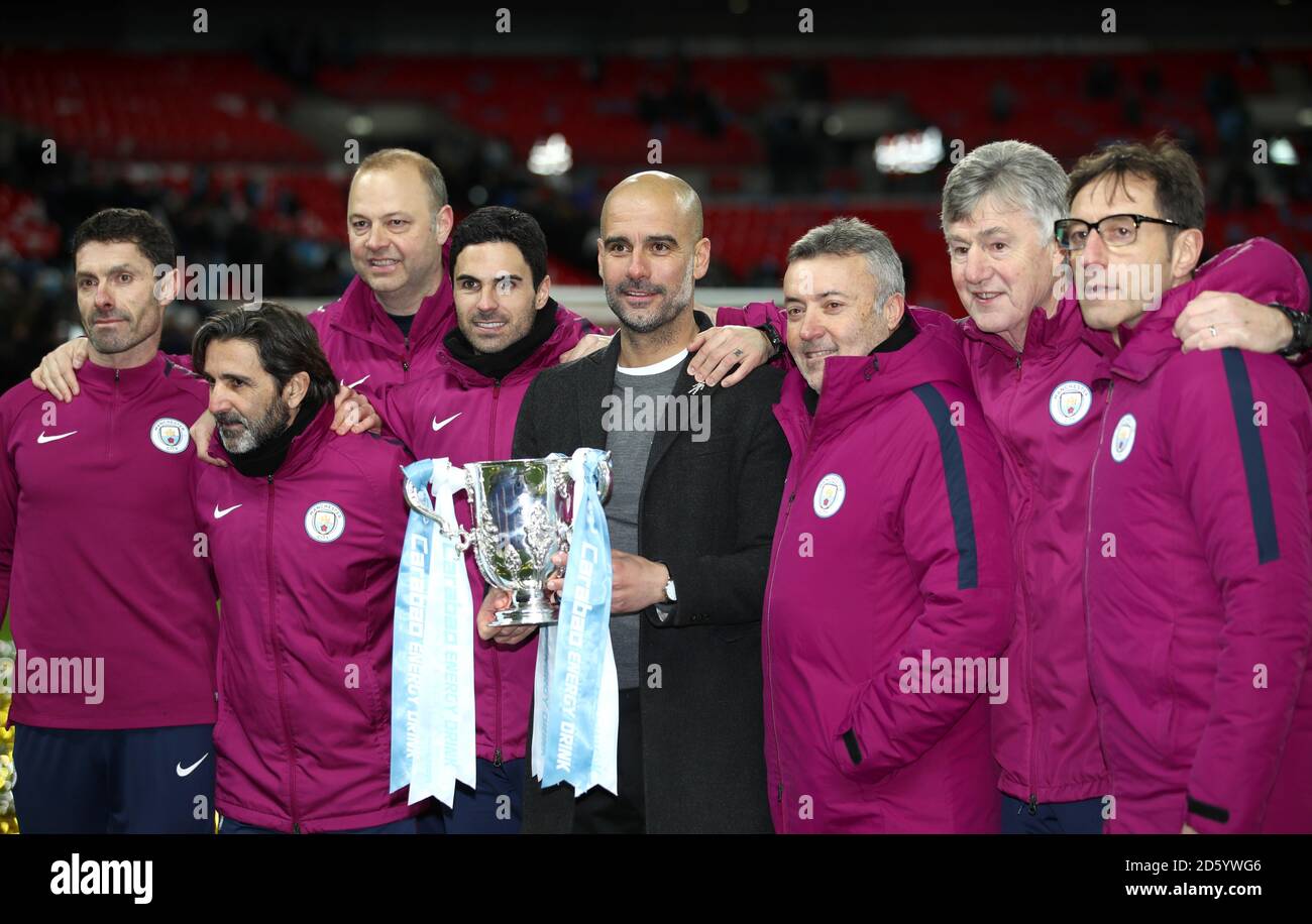 Manchester City manager Pep Guardiola and coaching staff with the ...