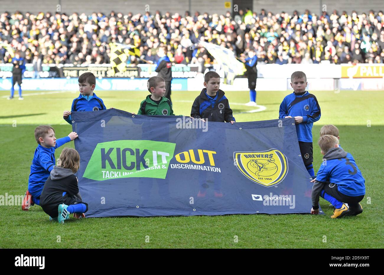Child mascots hold a 'Kick It Out' anti racism and discrimination ...