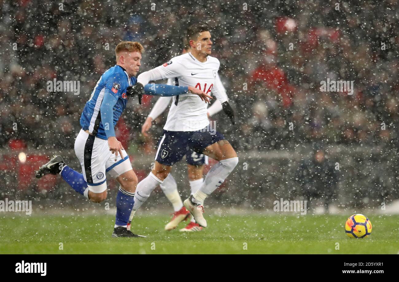 Rochdale's Callum Camps (left) and Tottenham Hotspur's Erik Lamela ...