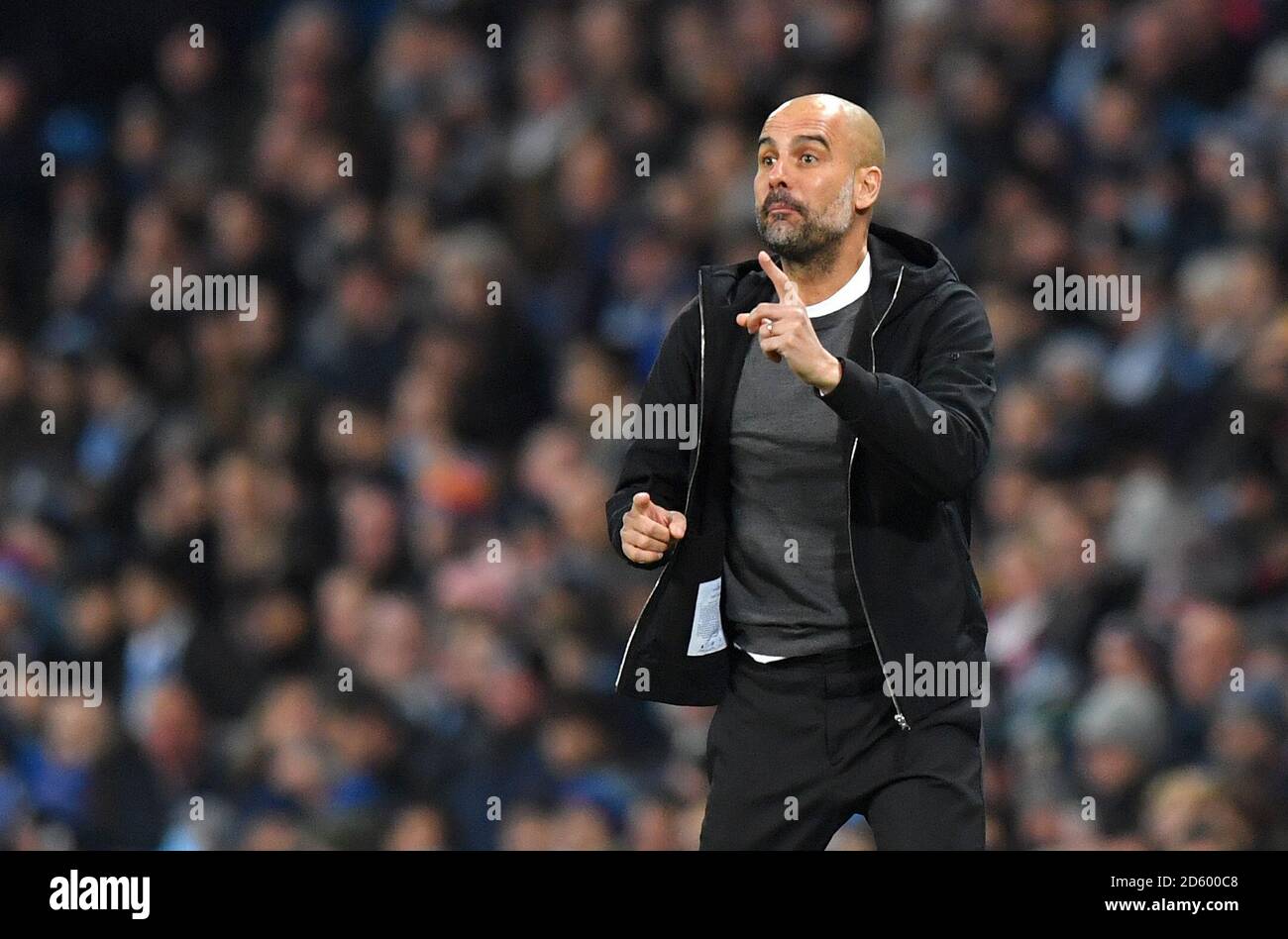 Manchester City manager Pep Guardiola gestures on the touchline Stock ...