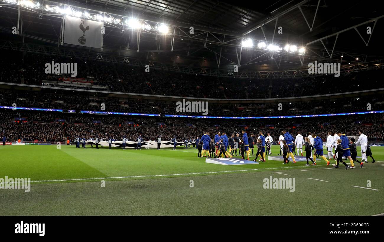The two team's walk out before kick-off Stock Photo - Alamy