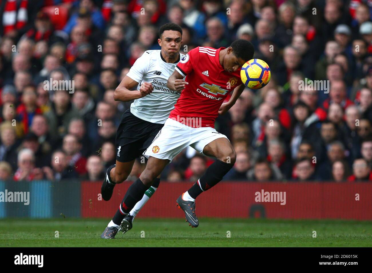 Manchester United's Marcus Rashford runs past Liverpool's Trent ...