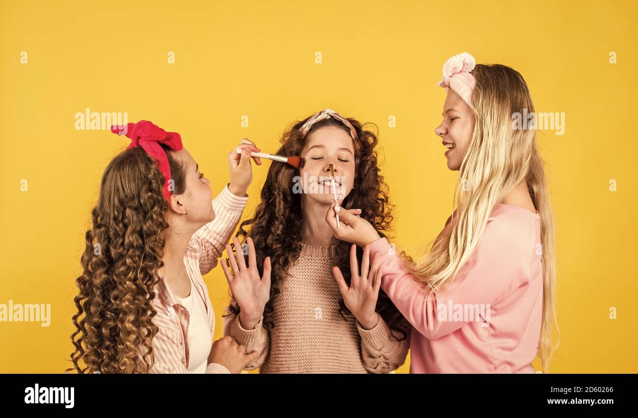Beauty team. Girls friends have fun beauty salon. Children with make up ...