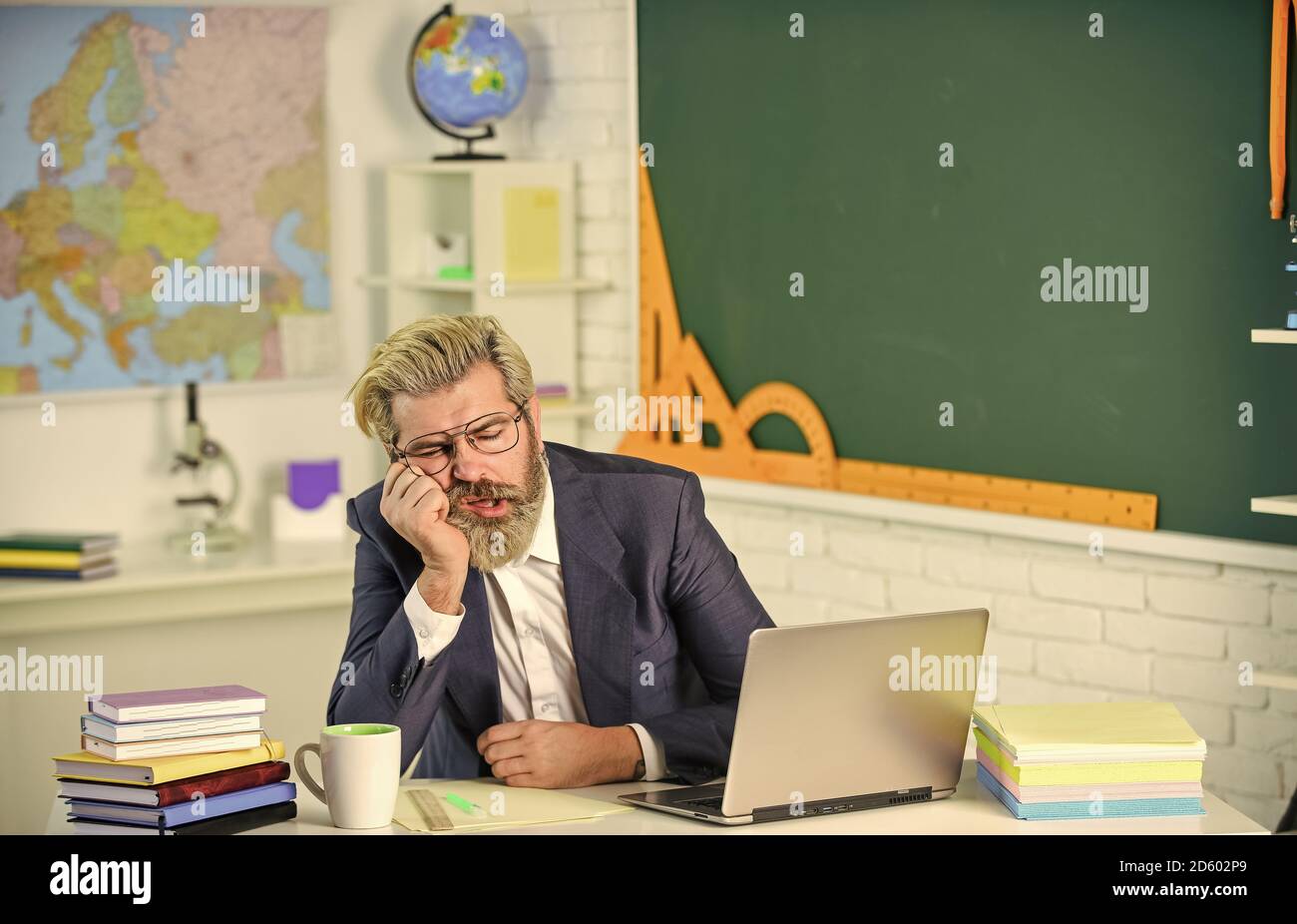 Sleep solves everything. Bearded man sleep in class. Senior teacher ...