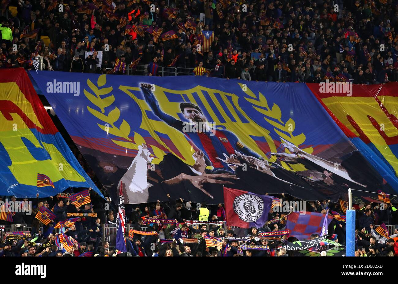 Barcelona fans hold up a Lionel Messi banner Stock Photo - Alamy