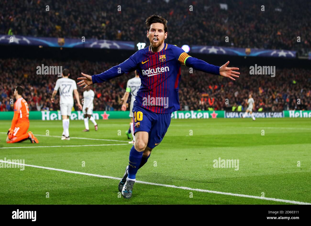 Barcelona's Lionel Messi celebrates scoring his side's third goal of ...